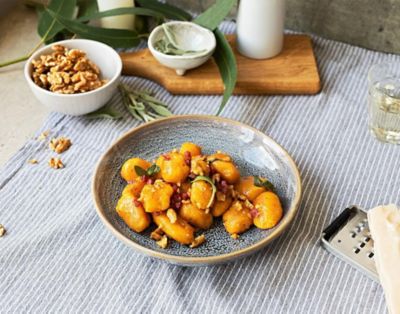 Pumpkin gnocchi with sage butter, walnuts, and smoked bacon