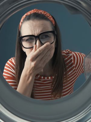 Dixan | Come pulire una lavatrice che puzza